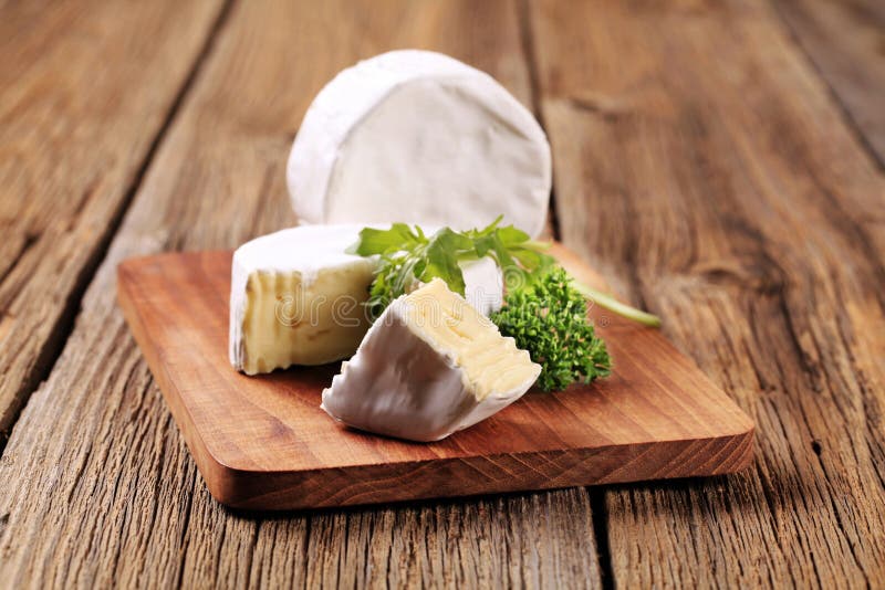 White rind cheese stock image. Image of white, board - 19949973