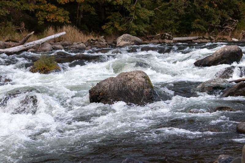 White Water Running Over Rocks in the Middle of the River Stock Image ...
