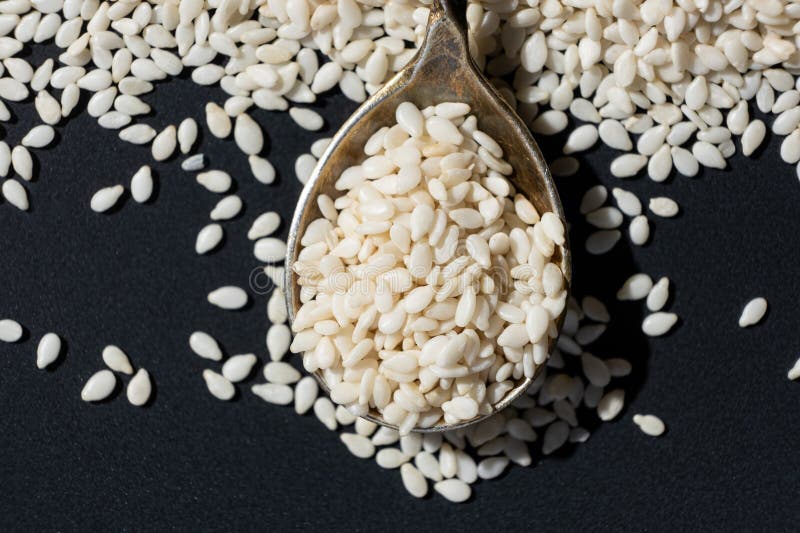 White Roasted Sesame Seeds in a Spoon Stock Image - Image of crop ...