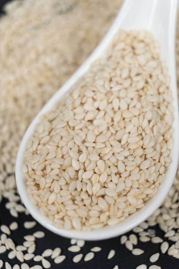 White Roasted Sesame Seeds in a Spoon Stock Photo - Image of seed ...