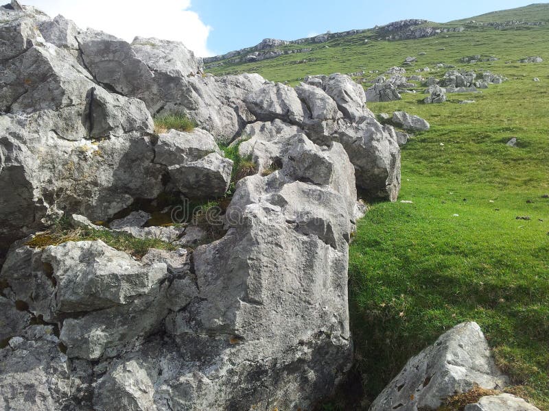 White rocks on hillside stock photo. Image of ruins - 301566012