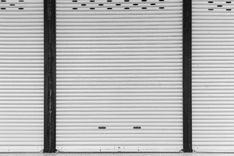 White Roller Shutter Door of the Store is Closed Stock Image - Image of ...