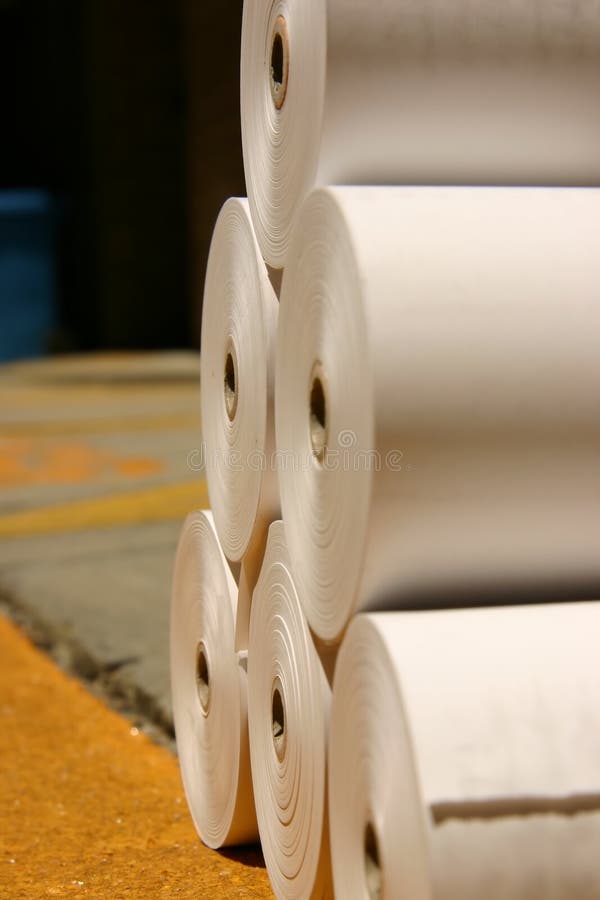 White Rolls of Printing Paper on a Loading Dock Stock Image - Image of ...