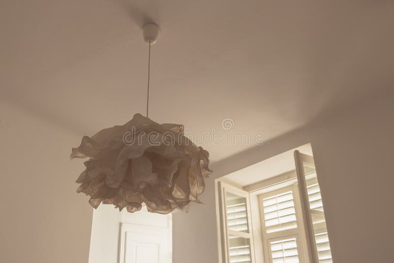 White Room with a White Light Fixture on the Ceiling and Bright ...