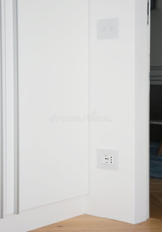 White Room Wall with Socket Plug and Glass Light Switch Stock Image ...