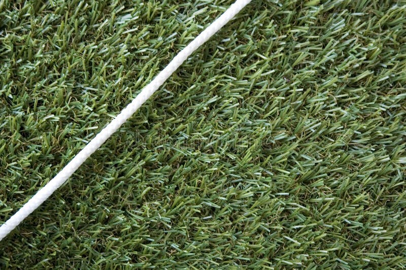 White Rope in the Corner of Grass Stock Photo - Image of background ...