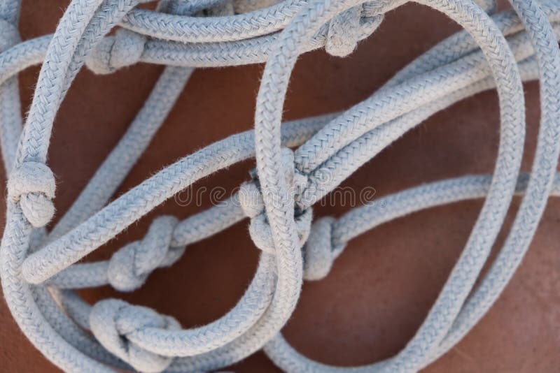 White rope with knots stock photo. Image of link, closeup - 82708762