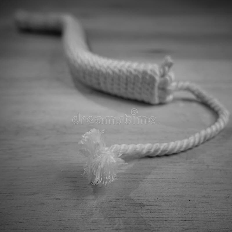 White Rope on the Wooden Table in Black and White Stock Photo - Image ...