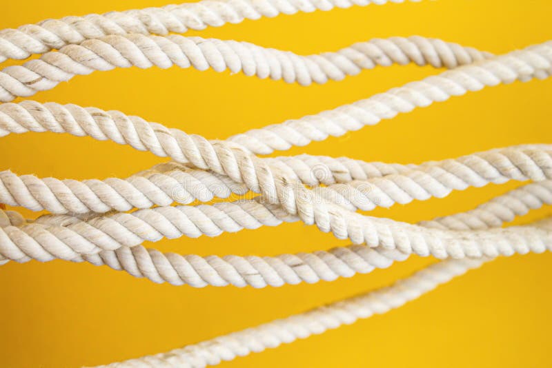 White Rope on a Yellow Background. Rope Close-up Stock Photo - Image of ...