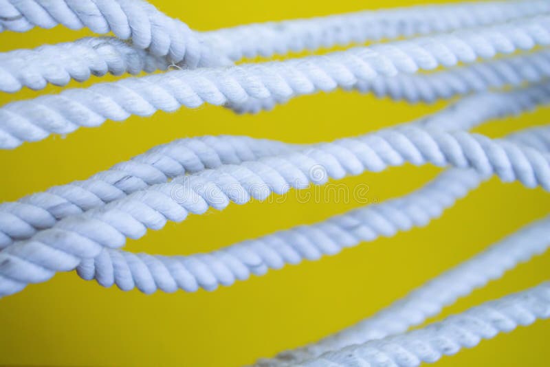 White Rope on a Yellow Background. Rope Close-up Stock Photo - Image of ...