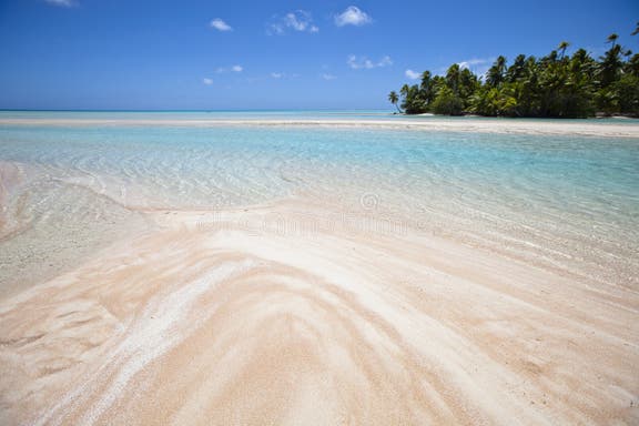 White and Rose Sand Beach with Blue Lagoon Stock Photo - Image of ...