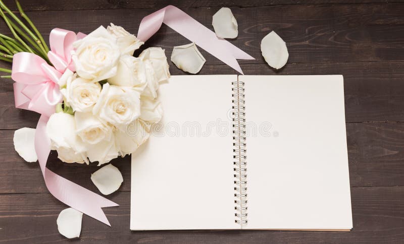White Roses Flower with Ribbon are on the Noteboo Stock Image - Image ...