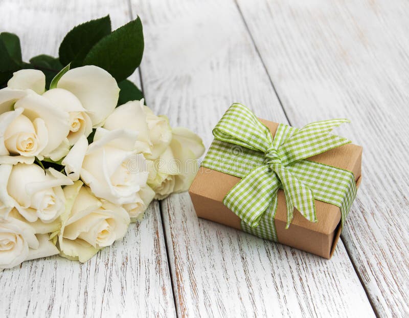 White roses and gift box stock photo. Image of closeup - 83694624