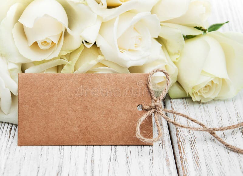 White roses with tag stock image. Image of anniversary - 84635771