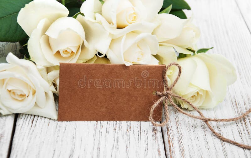 White roses with tag stock image. Image of anniversary - 84635771
