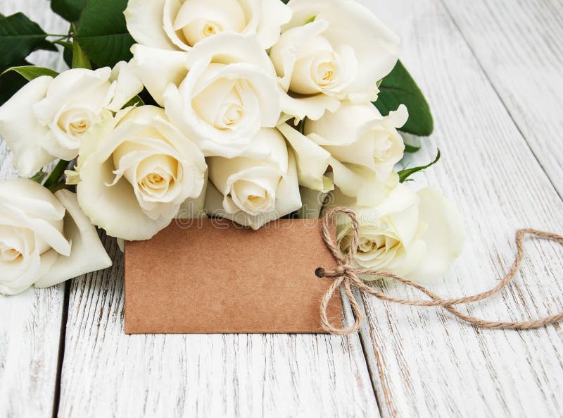White roses with tag stock image. Image of anniversary - 84635771