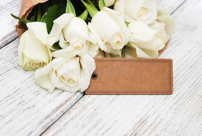 White roses with tag stock image. Image of beauty, anniversary - 86537275