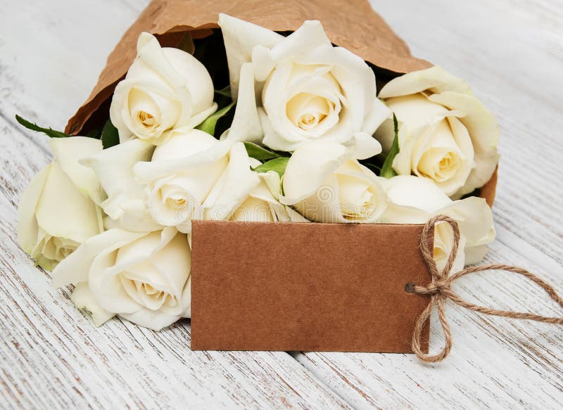 White roses with tag stock image. Image of anniversary - 84635771