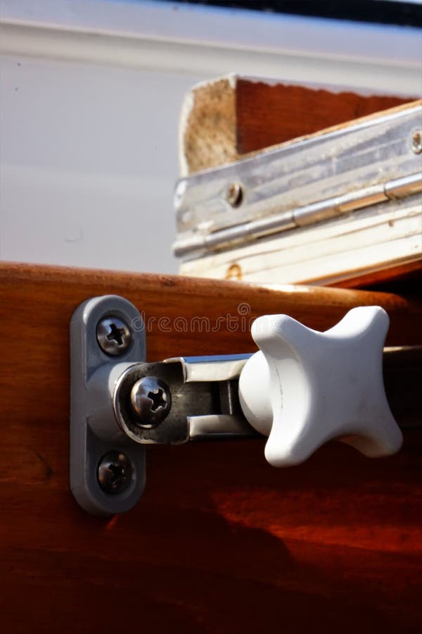 White Rotary Knob on Sliding System for Opening Access To Space. Stock ...