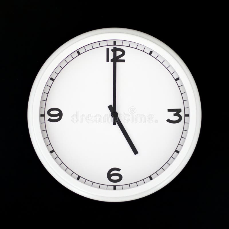 White Round Analog Wall Clock Isolated on Black Background Stock Photo ...