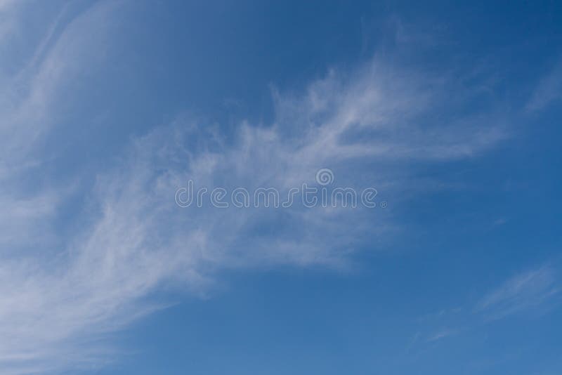 White Round Cloud, Shaped Like Feather, on Blue Sky. Stock Image ...