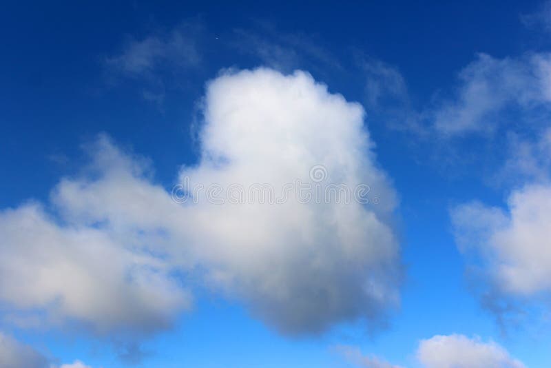 A puffy white round cloud stock photo. Image of lonely - 78994260