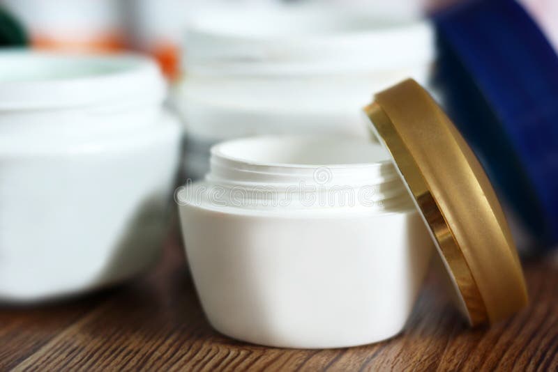 White Round Glass Containers with Beige Cream Stock Photo - Image of ...