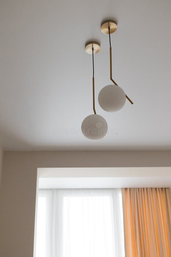 A White Round Light Bulb in a Modern Interior of a House Room Stock ...