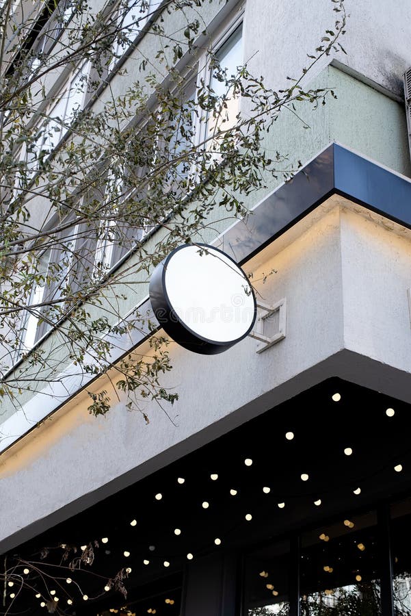 White Round Logo on Building Wall , Exterior for Mockup Design Stock ...