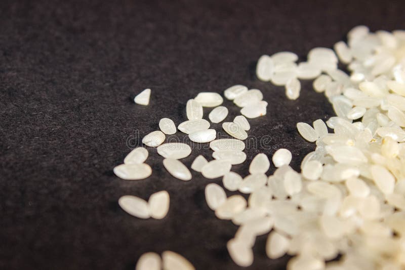 White Round Rice Close-up on a Black Background Stock Image - Image of ...