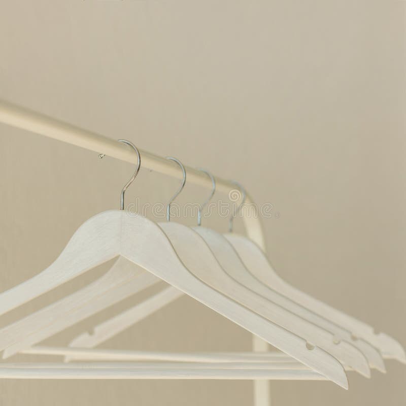 White Row of Hangers on the Rack. Stock Photo - Image of pink, cloth ...