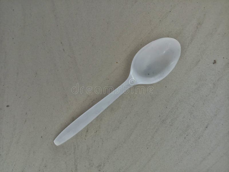 White Rubber Spoon on Tiled Floor Stock Photo - Image of lighting ...