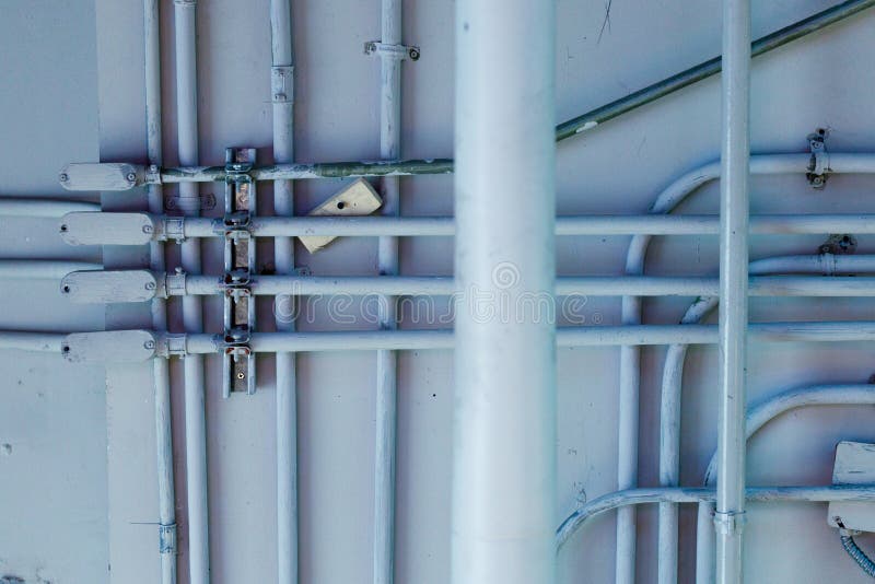 White Rustic Ceiling Background with Pipes and Conduits Stock Photo ...