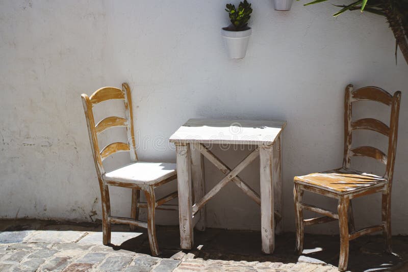 White Rustic Table and Chairs on an Outdoor Terrace Stock Photo - Image ...