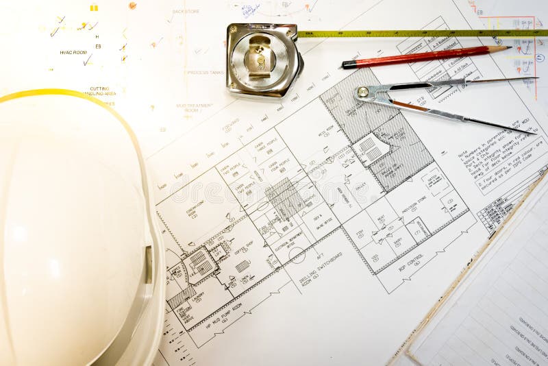 White Safety Helmet and Drawing Tools on Naval Architects Working Desk ...