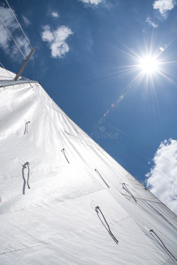 White Sail on a Boat Against the Sky on a Sunny Day Stock Image - Image ...