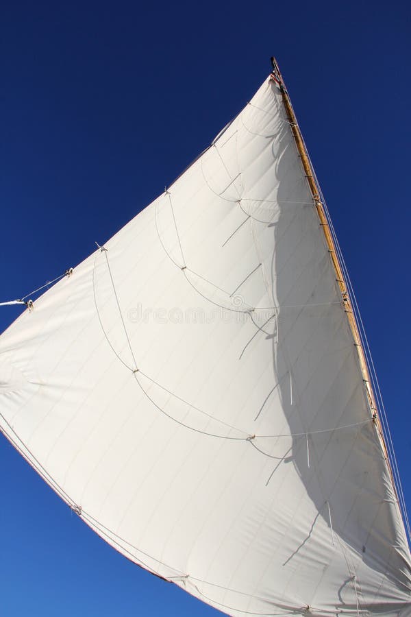 White Sail of a Sailboat in the Sky Stock Image - Image of yachting ...