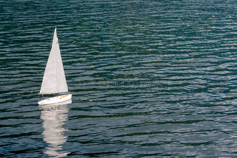 White Sailing Yacht Model Floating in the Lake Stock Image - Image of ...