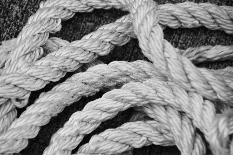 Sailor Rope and Knot on a Wooden Pier at the Seaside - Black Backgound ...