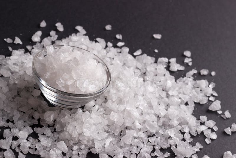 White salt crystals stock photo. Image of grain, black - 77645898