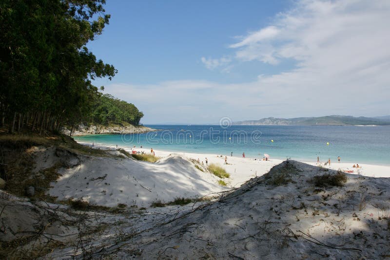 White Sand Beach with Turquoise Water with People Bathing Stock Photo ...