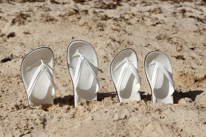 White Sandals. White Sandals on the Beach. Stock Image - Image of beach ...