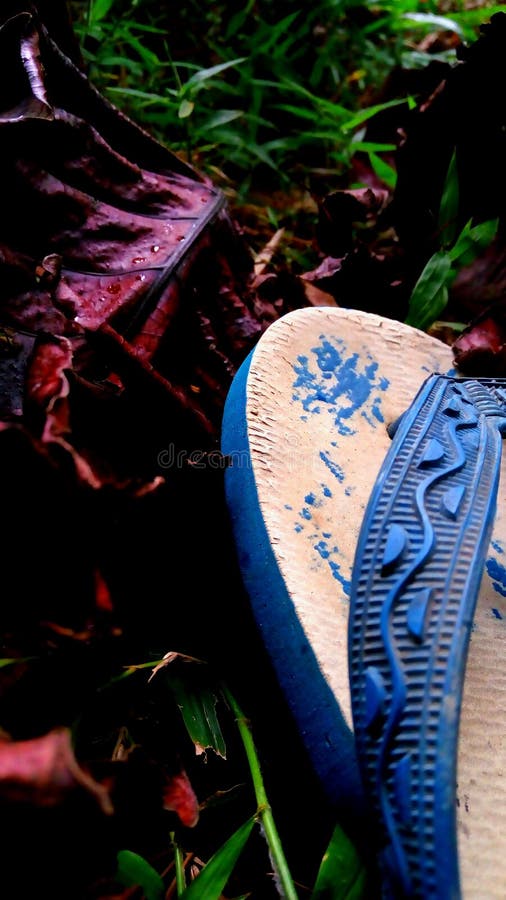 White Sandals Peeled Off the Friction of the Feet on the Grass and Dry ...