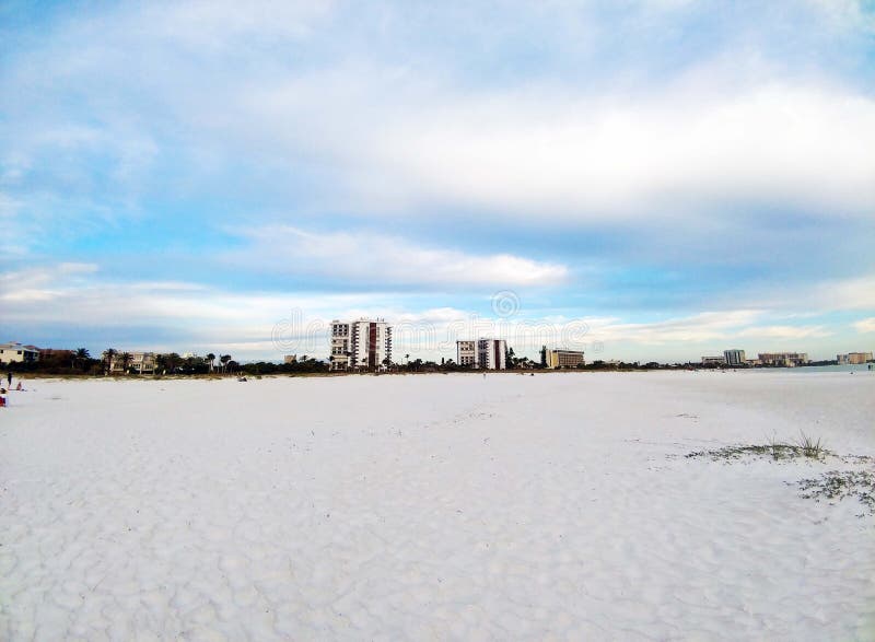 White Sandy Beach Under a Blue Sky Stock Photo - Image of beach ...
