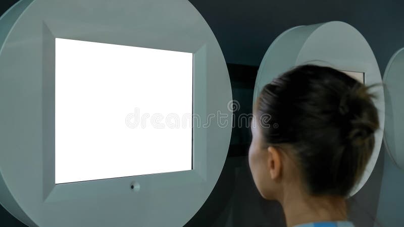 White Screen Concept - Woman Looking at Blank White Display Wall at ...