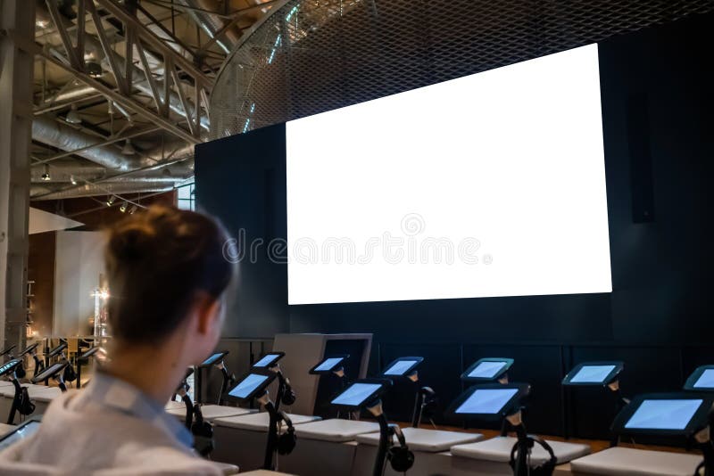 White Screen Concept - Woman Looking at Blank Interactive White Display ...