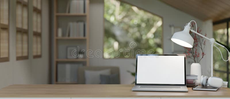 A White-screen Laptop Computer on a Table in Minimal Modern Living Room ...