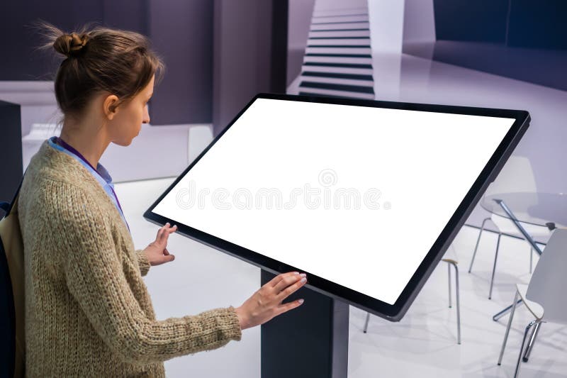 Woman Using Interactive Empty White Touchscreen Display Kiosk at ...