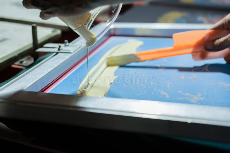 White Screen Printing Ink Poured into a Screen Printing Frame Stock ...