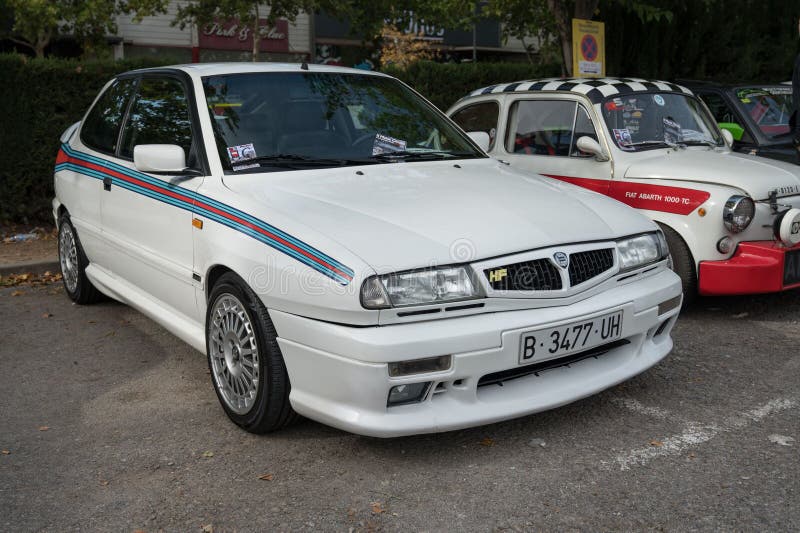 White Second Generation Lancia Delta HF with Martini Racing Lines on ...